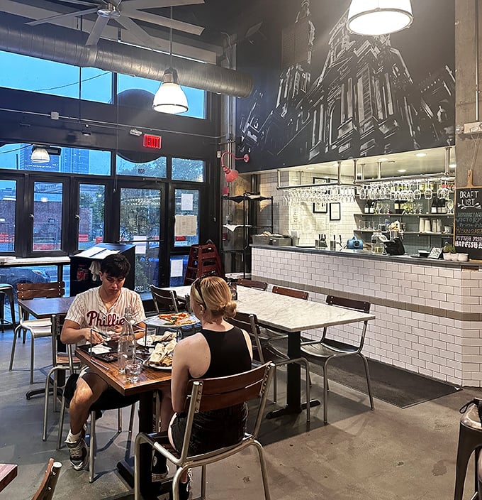 Even Phillies fans pause between bites—this pizza demands your full attention and gets it, no matter what's happening at Citizens Bank Park.