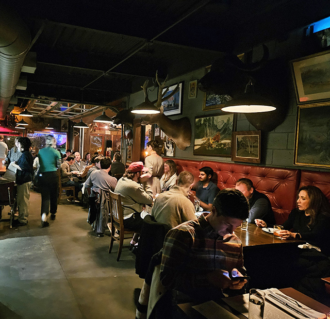 The dining room hums with the universal language of good food. Notice how nobody's looking at their phones? That's the Stanbury effect.