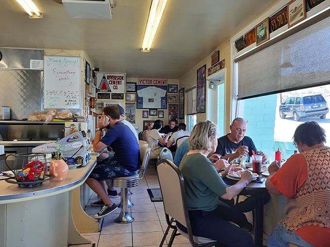 The breakfast crowd at Emma Jean's isn't just eating – they're participating in a daily ritual where strangers become neighbors over eggs and coffee.