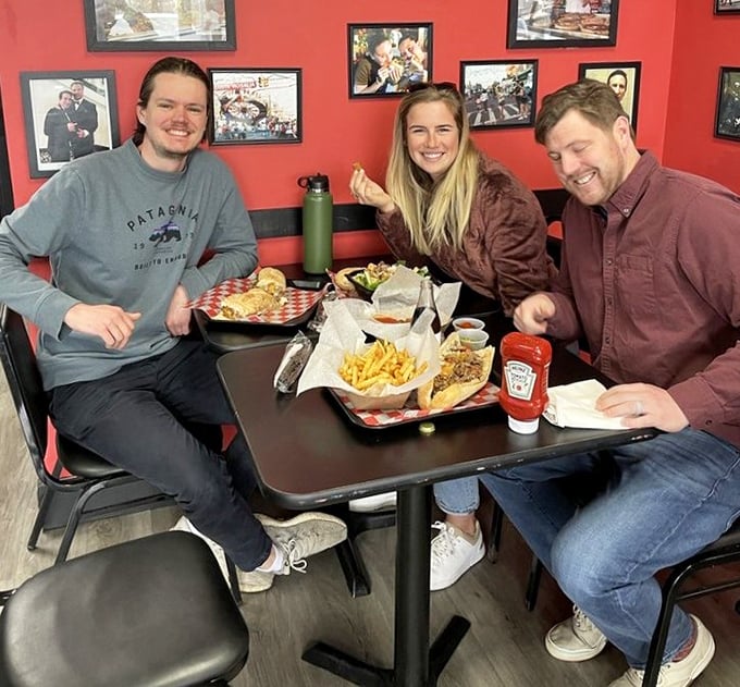 Happy diners experiencing the universal language of good food – that moment when conversation stops and appreciative nodding begins.