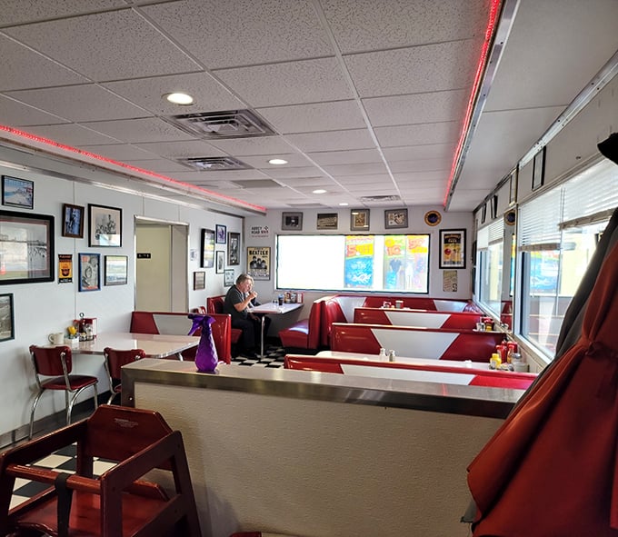 Even during quiet moments, Starlite's dining room hums with possibility—red booths waiting for the next round of hungry patrons seeking comfort food and conversation.