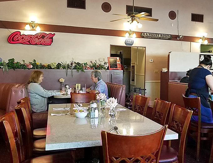The dining room hums with conversation and clinking silverware—the soundtrack to every great American diner experience.