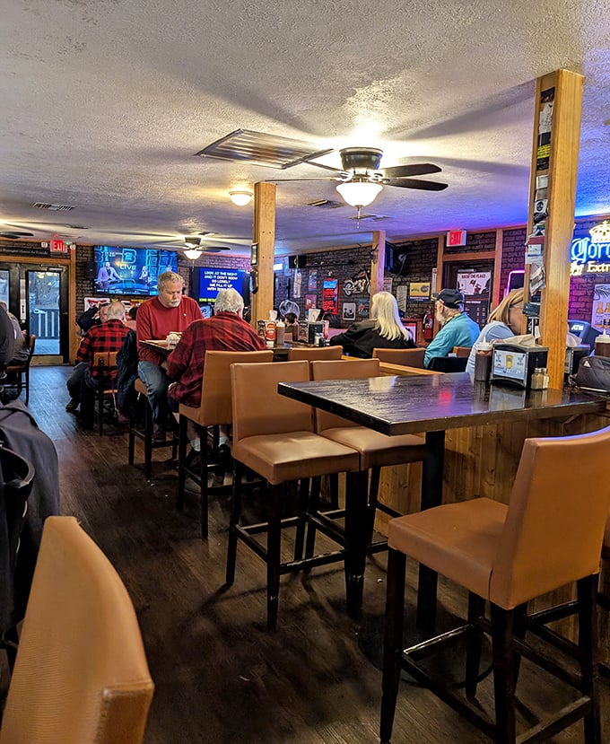 The dining area feels like your favorite uncle's den—if your uncle happened to be a barbecue wizard with excellent taste in wood paneling.