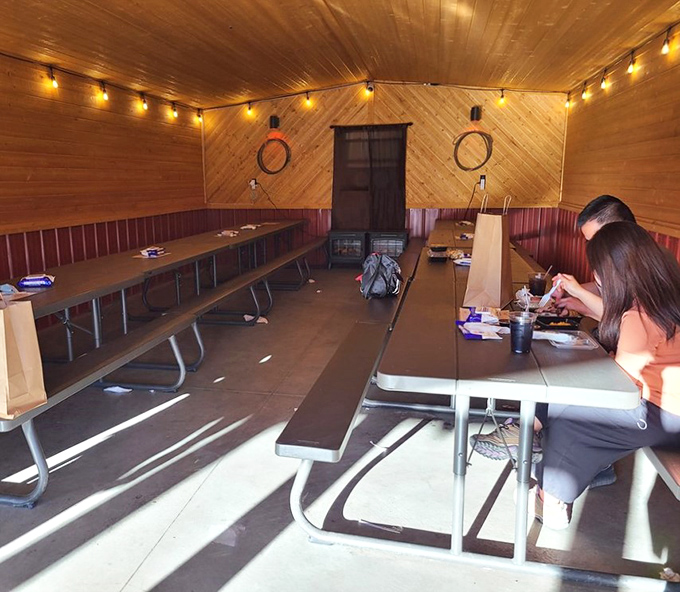 The dining area might be humble, but it's witnessed countless moments of BBQ-induced joy – string lights included at no extra charge.