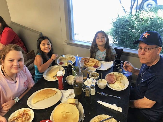 Family gatherings around Blue Bonnet tables create memories that last longer than the meal itself—though the pancakes are memorable.