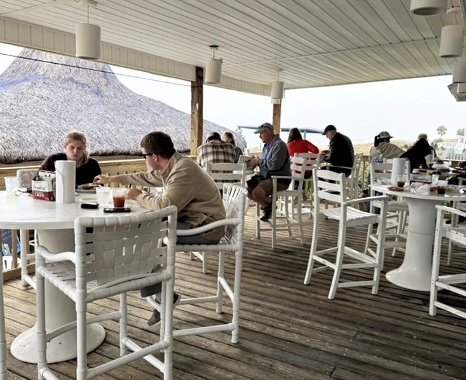 The elevated deck seating offers the perfect middle ground between "nice restaurant" and "I just came from the beach." Vacation dining perfected.