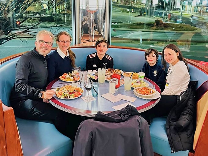 The circular booths aren't just comfortable—they're conversation incubators where family memories are made between bites of perfect diner fare.