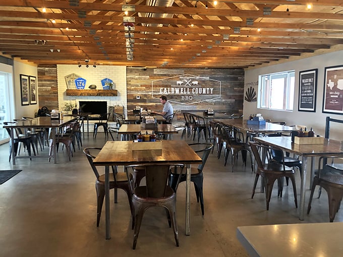 The dining room feels like a BBQ sanctuary, where wooden tables and metal chairs invite you to worship at the altar of smoked meat.