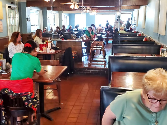The dining area hums with conversation and clinking silverware—a community gathering place where regulars and first-timers share the universal language of good food.