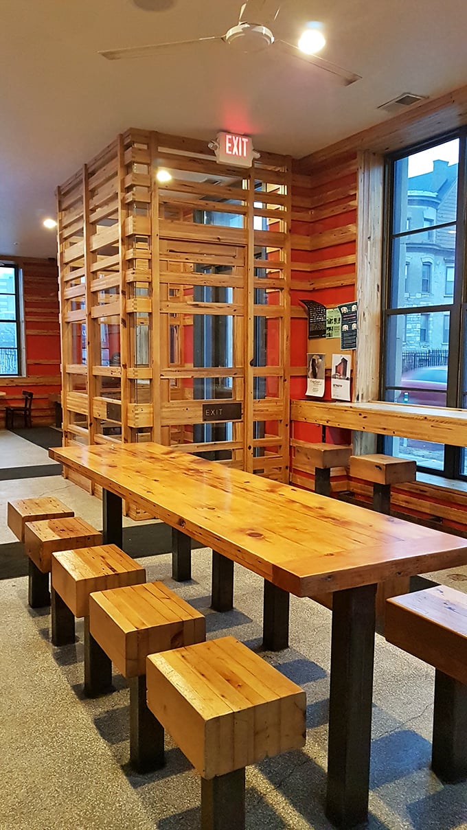 Communal dining at its most honest – these chunky wooden tables and stools say, "Sit down, make friends, get messy."