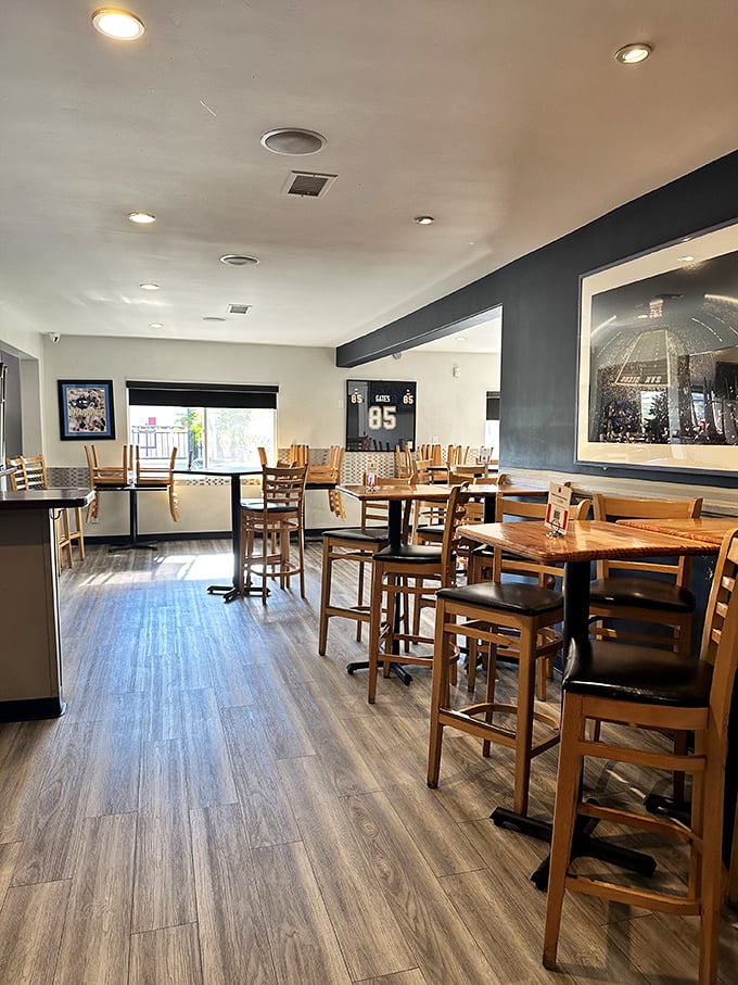 High-top tables, sports memorabilia, and wooden chairs that say "we care more about our smoker than our furniture"—as it should be.