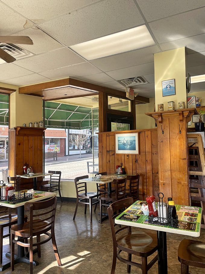 Sunlight streams through windows illuminating wooden tables where countless "remember when" conversations have unfolded over pancakes.