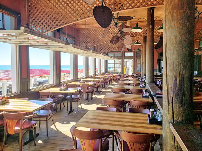 Floor-to-ceiling windows ensure you never miss a wave while dining, turning every table into the best seat in the house.
