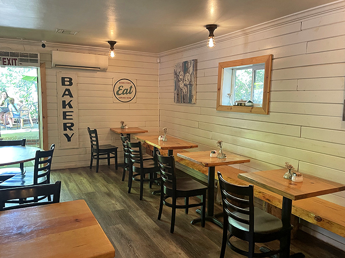 The "BAKERY" and "EAT" signs aren't just decor – they're the simplest instructions you'll ever need to follow in this cozy corner.