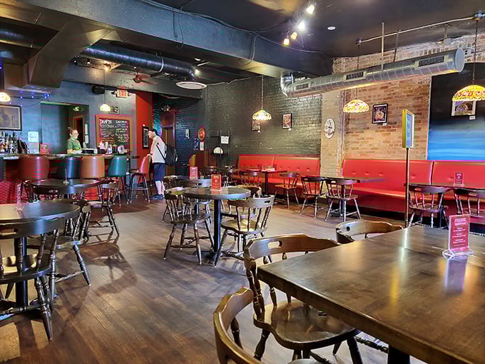 The dining area balances dive bar authenticity with unexpected comfort, like finding your favorite recliner in a rock concert.