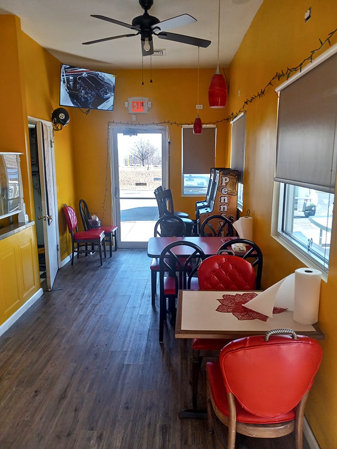 The narrow dining room feels like someone's cheerful kitchen, where strangers become friends over the universal language of "pass the sauce."