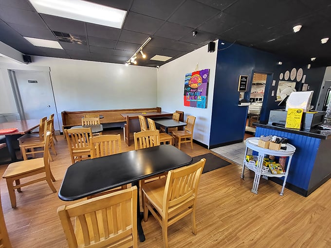 Simple wooden tables and chairs say, "We put our energy into the pizza, not fancy furniture." And that's exactly right.
