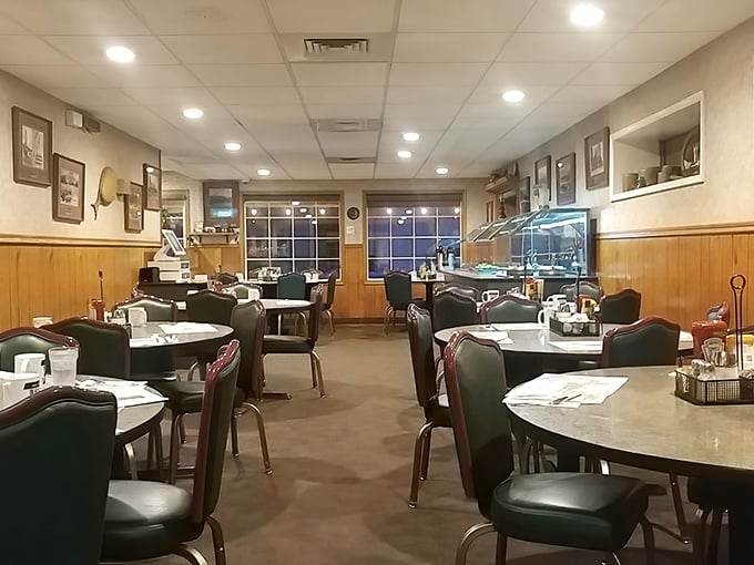 The dining area after hours—tables waiting for tomorrow's breakfast rush like an empty stage before the performance begins.