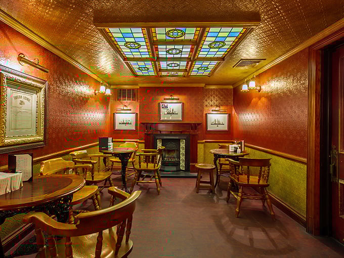 The dining room feels like your eccentric aunt's parlor—if she had impeccable taste, a stained glass ceiling, and a deep appreciation for comfort.