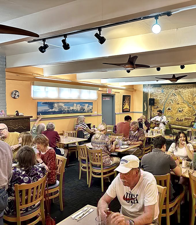 The dining room hums with the symphony of forks meeting plates and stories being shared. Those ceiling fans have witnessed countless food epiphanies.