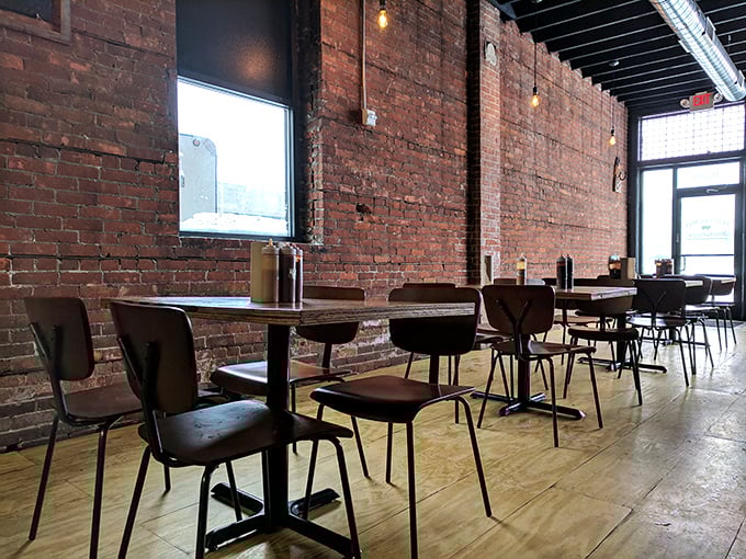 Simple wooden tables and brick walls let you focus on what matters—the meat masterpieces about to arrive on your plate.