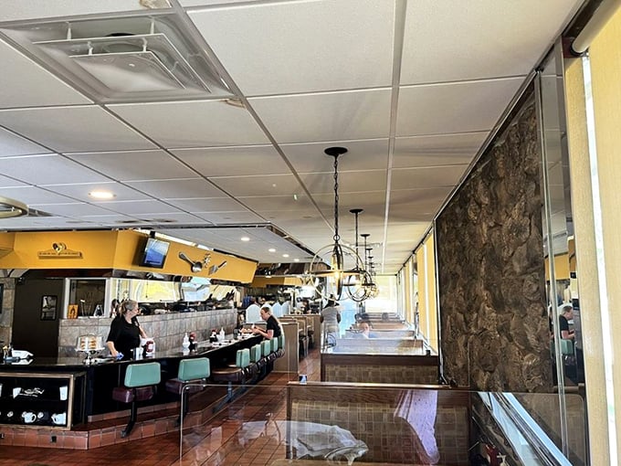 Terra cotta floors and comfortable booths create the perfect backdrop for the daily ritual of breaking bread with friends and strangers alike.