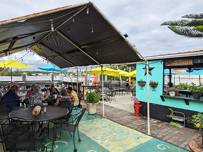Colorful umbrellas, waterside views, and that unmistakable Florida breeze—dining doesn't get more perfect than this little slice of paradise.