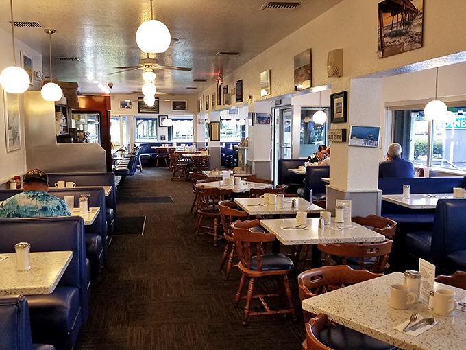 The dining room hums with conversation and clinking silverware—a symphony of satisfaction orchestrated by hungry patrons.