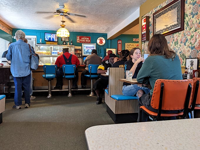 The counter seats are where the magic happens—where regulars exchange local wisdom and newcomers are welcomed into the Fred's family.