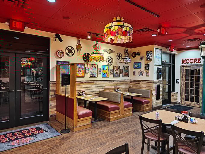 The dining area balances nostalgia and comfort with its wooden booths and eclectic wall decorations. Breakfast with a side of Americana.