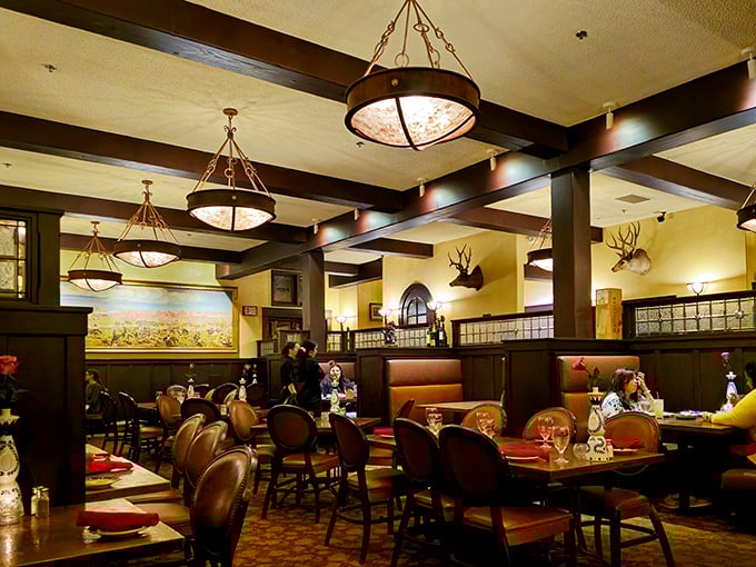 The dining room balances Western ruggedness with unexpected elegance. Those pendant lights have witnessed countless celebrations and first dates.