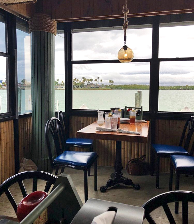 Waterfront dining where every table offers front-row seats to nature's daily show of boats and endless blue horizons.