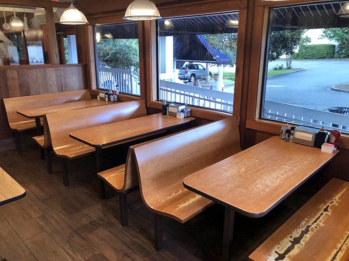 Classic diner booths where countless vacation plans have been hatched and food comas have been embraced. The windows offer prime people-watching while you contemplate second helpings.