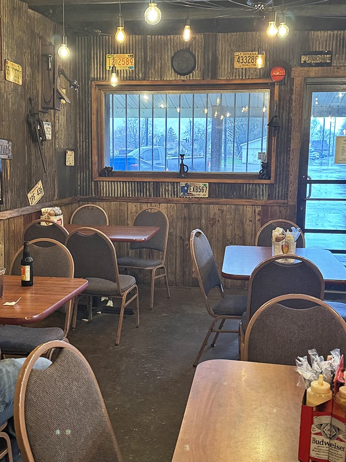 No white tablecloths here—just honest tables, practical chairs, and walls that have absorbed enough barbecue stories to write their own cookbook.
