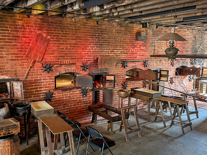 The workshop area feels like stepping into pretzel history class—wooden tables, brick walls, and tools that have twisted dough into edible art for generations.