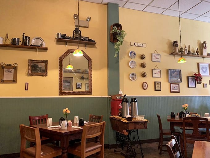Two-tone walls, vintage décor, and wooden tables create that "been here forever" charm that chain restaurants spend millions trying to fake.
