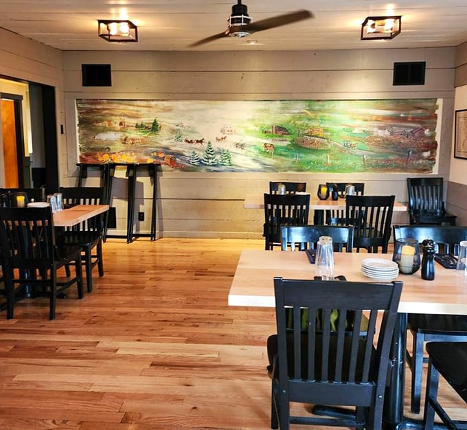 The dining room where conversations flow as easily as the drinks. That mural isn't just decoration—it's a conversation starter between bites.