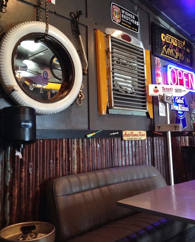 The interior feels like the coolest garage you've ever visited – where automotive memorabilia meets comfort food in perfect harmony.