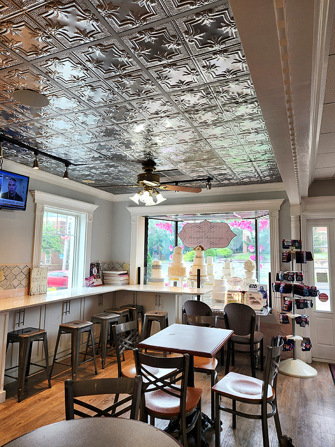 The dining area combines vintage charm with modern comfort, where that spectacular ceiling draws your eyes upward—unless there's cake nearby.