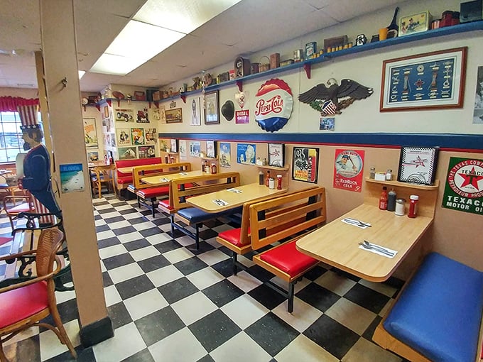 A retro dining area with checkerboard floors and nostalgic decor – where every booth feels like a time machine to simpler days.