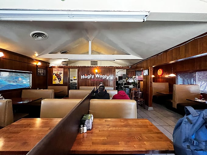 Comfortable booths and warm lighting create the perfect atmosphere for serious meat consumption and lingering conversations.