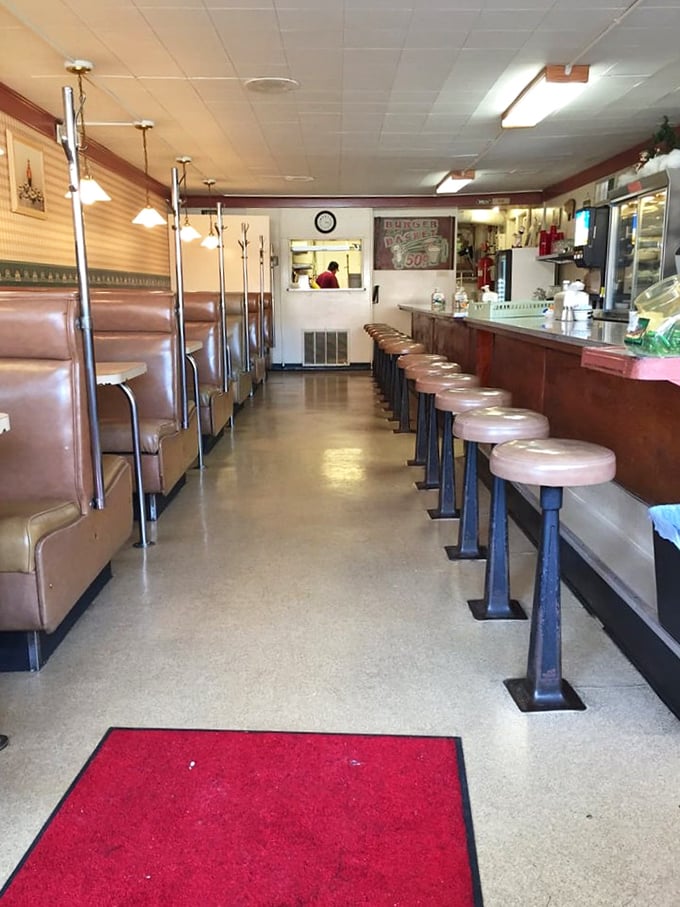 The well-worn path between booths and counter tells stories of countless meals, conversations, and coffee refills in this temple of comfort food.