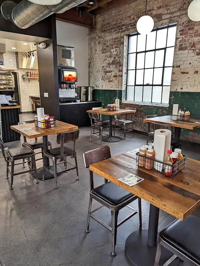 The dining room feels like barbecue's answer to a Brooklyn loft – industrial elements softened by warm wood and the promise of smoky delights.