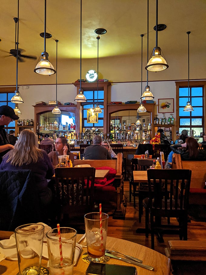 Warm wood tones and chalkboard specials create the kind of atmosphere where strangers become friends.