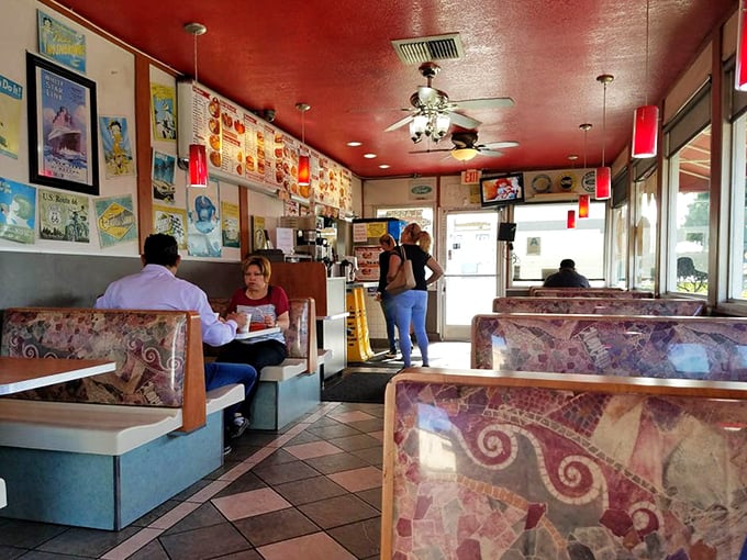 The dining room—where strangers become neighbors over the universal language of "mmm." Those booths have heard more life stories than most therapists.