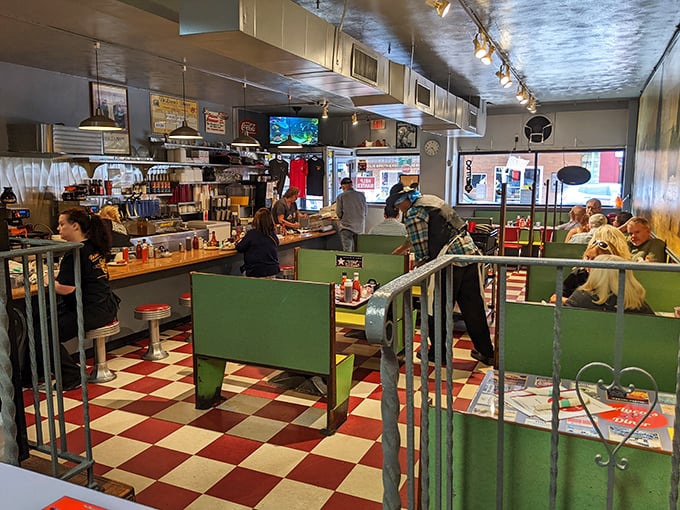 The classic checkered floor and green booths aren't retro by design—they're authentic by survival, hosting decades of Pittsburgh breakfast stories.