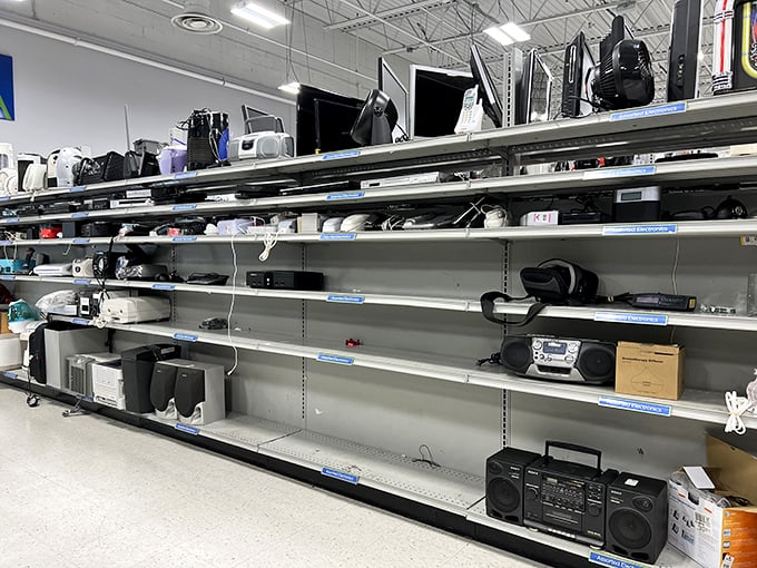 The electronics graveyard – where yesterday's cutting-edge technology finds new purpose. That boombox remembers the 80s better than I do.