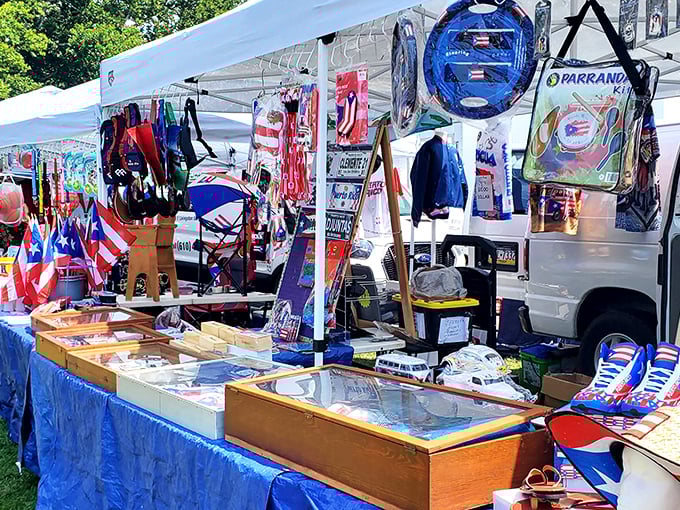 Flag-waving entrepreneurship at its finest! This vendor's patriotic display proves that red, white, and blue merchandise never goes out of style.