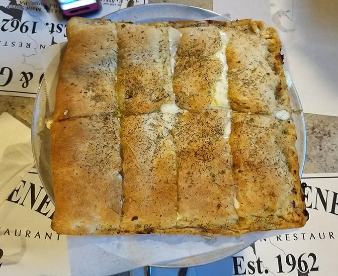 Another white pizza variation that proves Old Forge knows its way around dough. The crisp edges give way to a chewy interior that's simply irresistible.