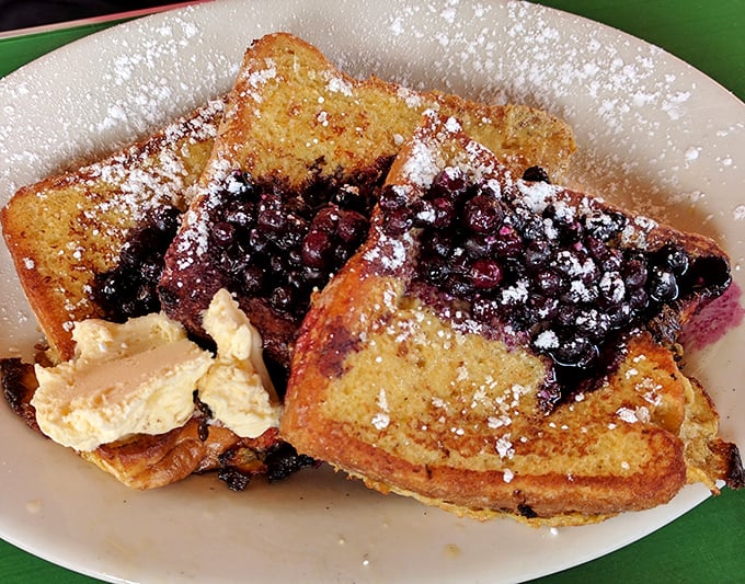 French toast that crossed over to the dark side—with blueberry compote and butter melting into every nook and cranny of golden bread.